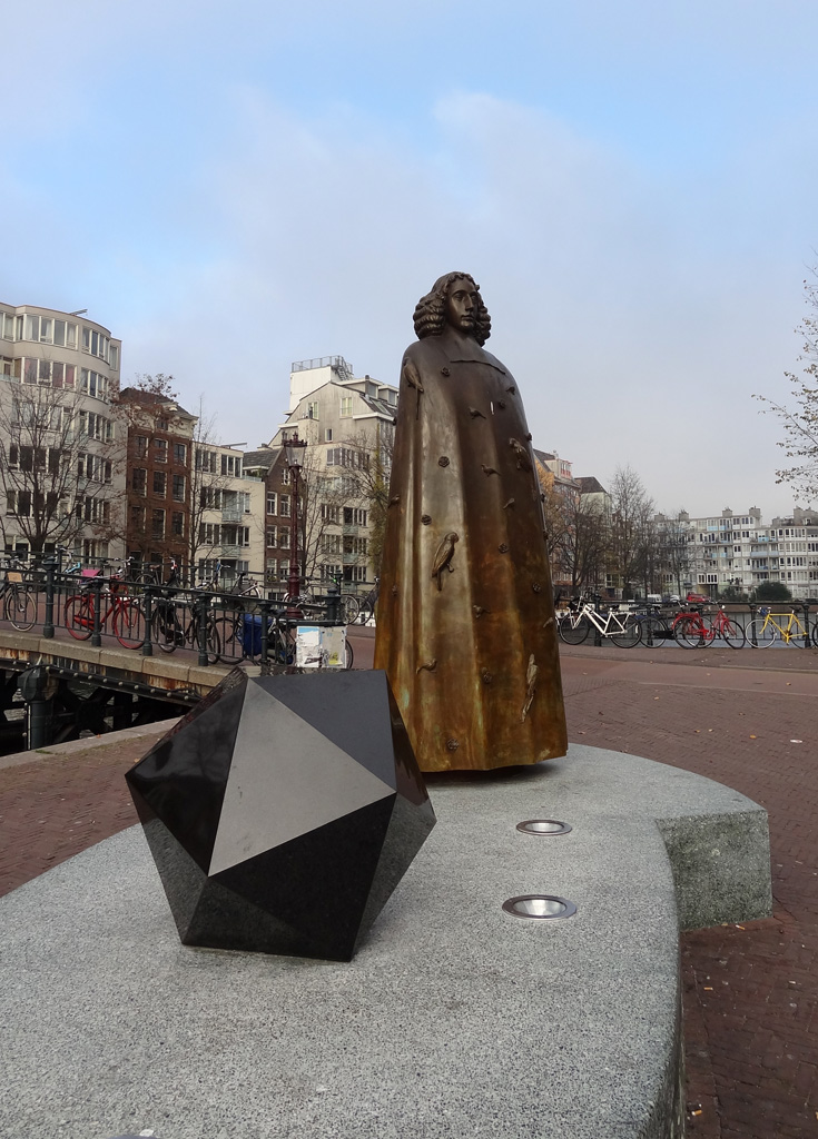 Kiwi's Angels: Statue of Spinoza with parrots in Amsterdam