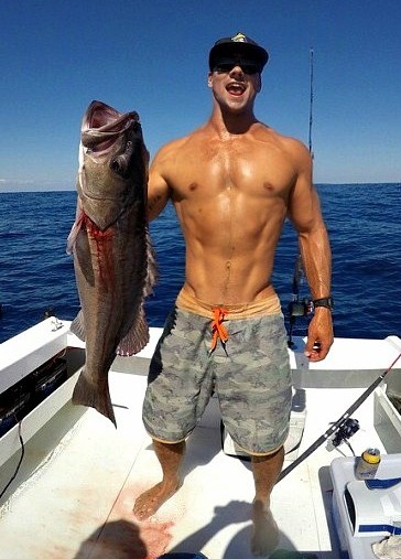 Seduced by the New...: That fish must've jumped into his arms...