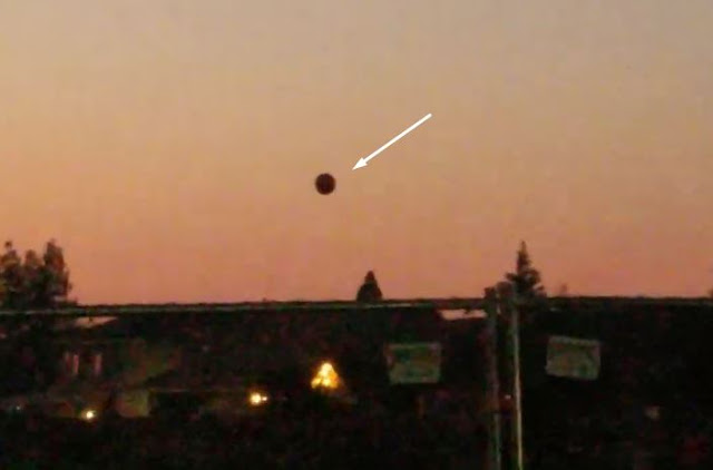 Perfect bizarre sphere filmed over California floating in the sky