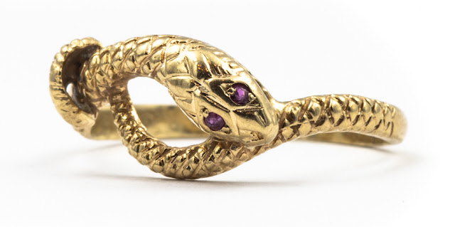 incredible gold Snake ring with ruby eyes | House of Magic Treasures