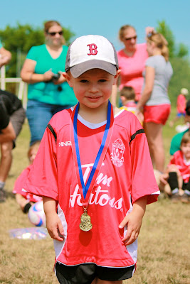 FROM THE DESK OF SARA: Russell Soccer: Timbits final kick of the season!