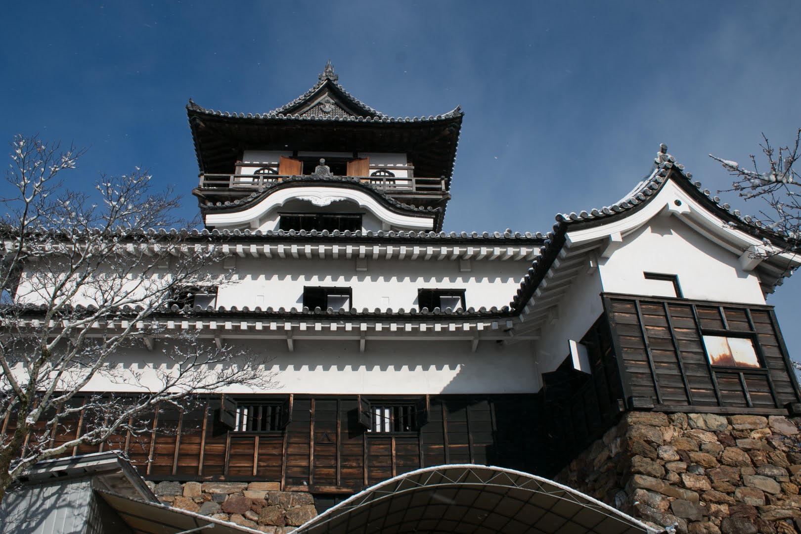 Inuyama Castle -Traditional style original main tower besides river ...