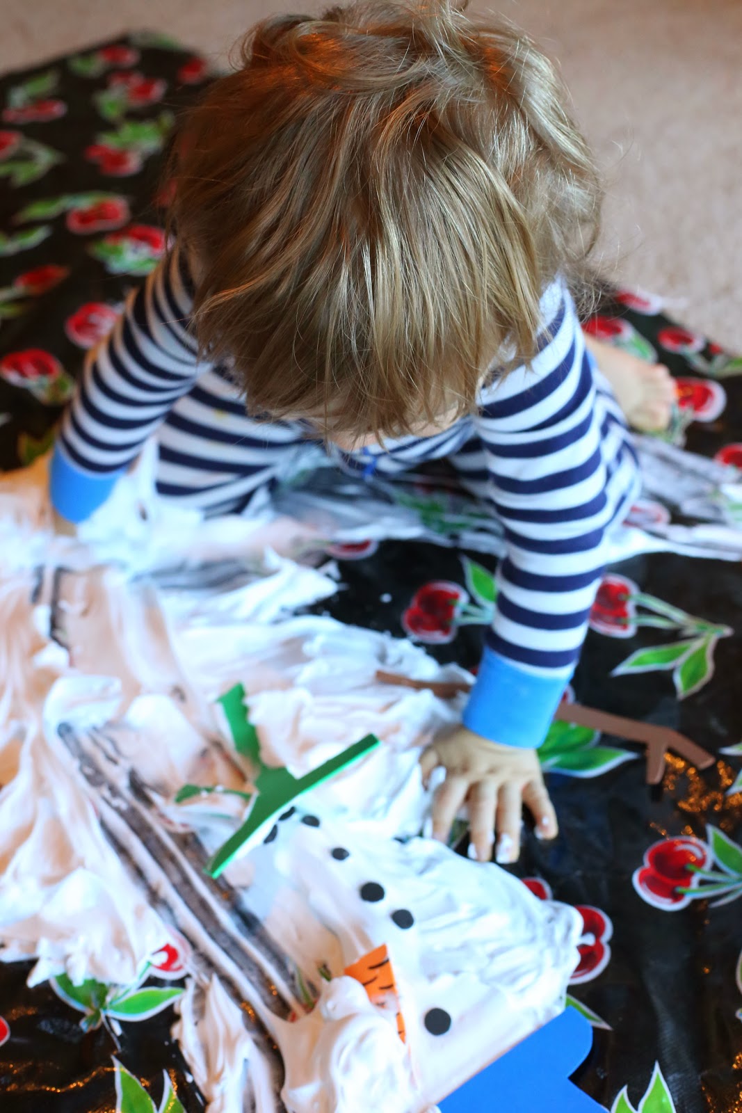 Messy Christmas Sensory Play: Demolish a Snowman!