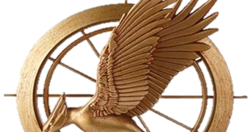 NEWS: Hallmark to release a 'Catching Fire' mockingjay pin Christmas ...