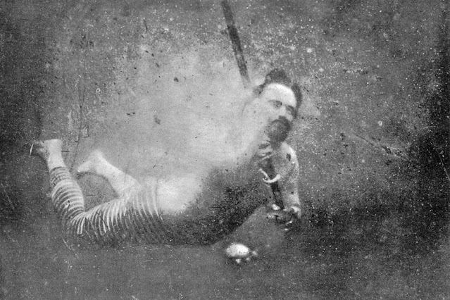 The first underwater photograph. At a depth of 195 feet in the ...