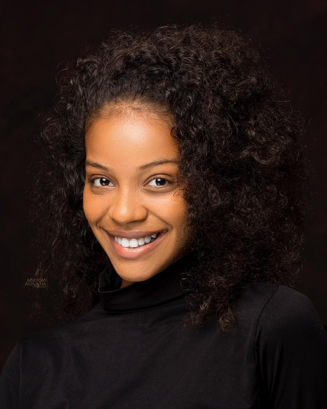 Photos of Uto Rosman with her natural hair and no makeup