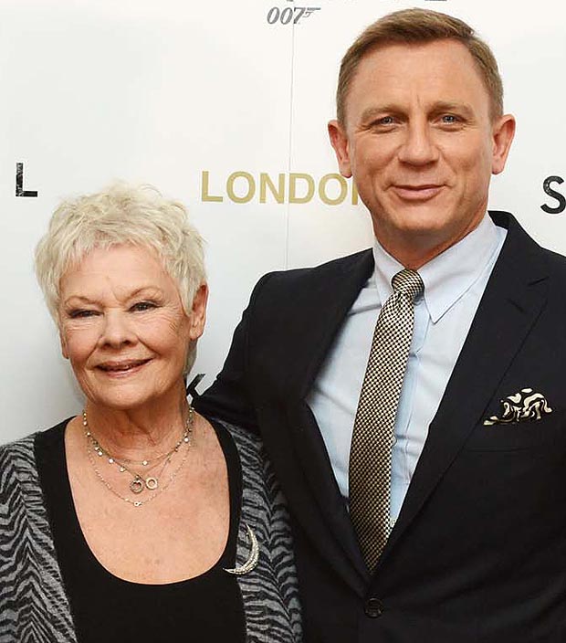 Daniel Craig and Dame Judi Dench protecting BBC - 007 Travelers