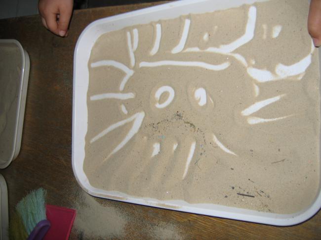 Early language skills through play.......: Sand play