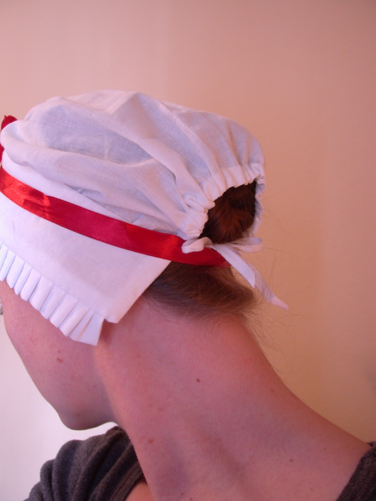 A Sartorial Statement: A Muff And A Mob Cap