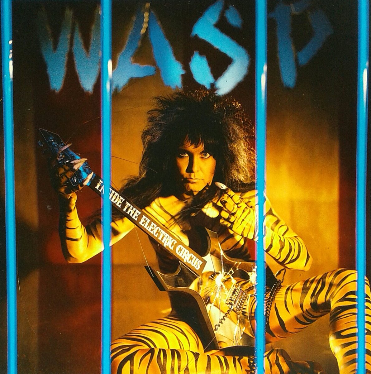 Classic Rock Covers Database: W.A.S.P. - Inside the Electric Circus (1986)