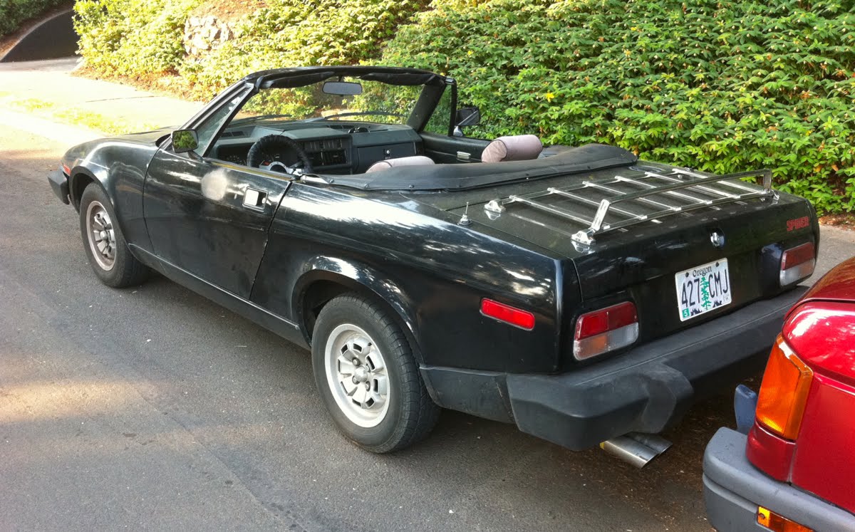 OLD PARKED CARS.: 1980 Triumph TR7 Spider.