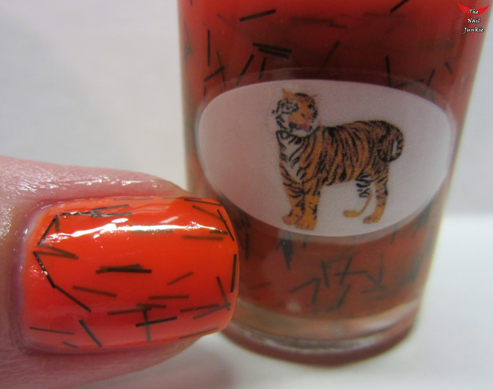 The Nail Junkie: NAIL ART: My "Tiger" Polish + Tiger Paws