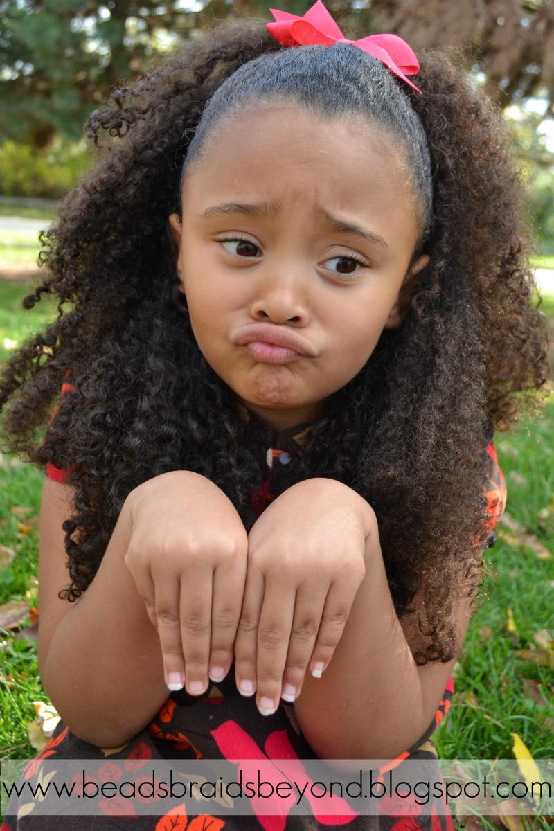 Beads, Braids and Beyond: Elongating Natural Curls With Banding