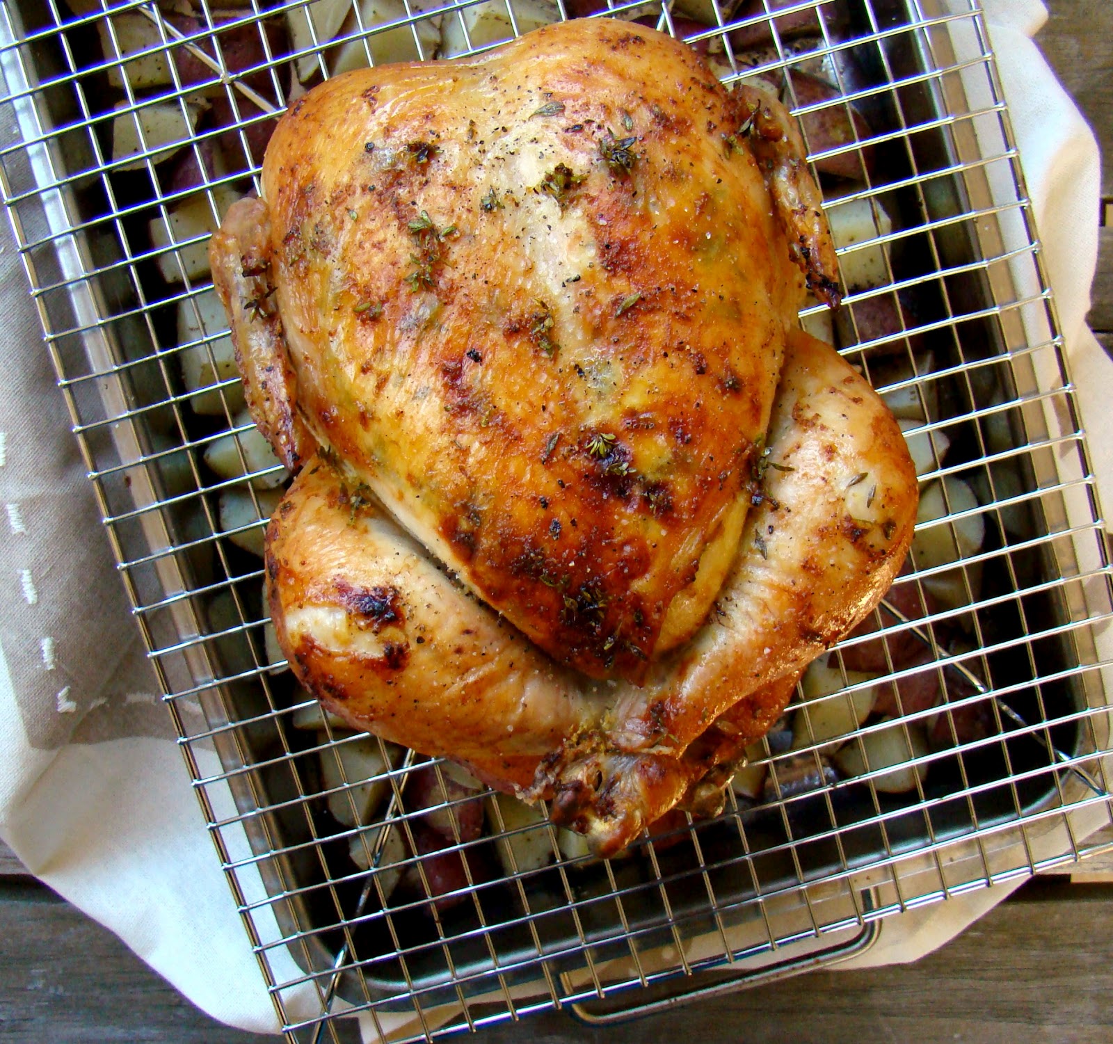 Lemon thyme roasted chicken with potatoes