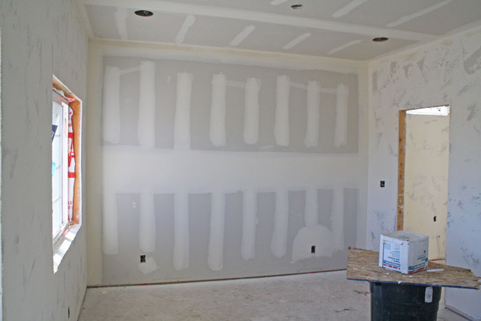 Rustic Mantle Beam Install and Drywall | Running With Scissors | Bloglovin’