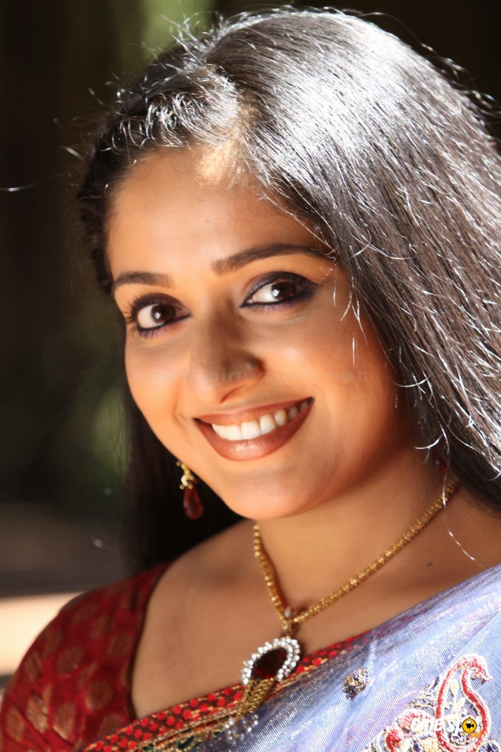 CAP: Kavya Madhavan Cute Images