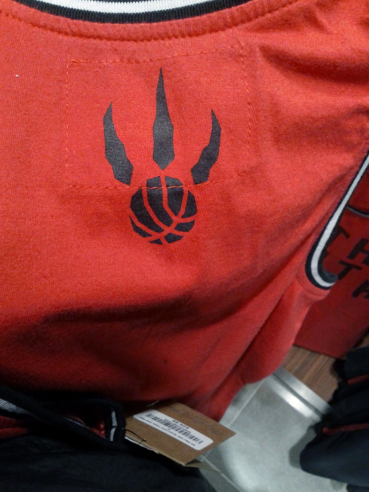 Toronto things: Toronto Raptors We the North red jersey and Property of ...