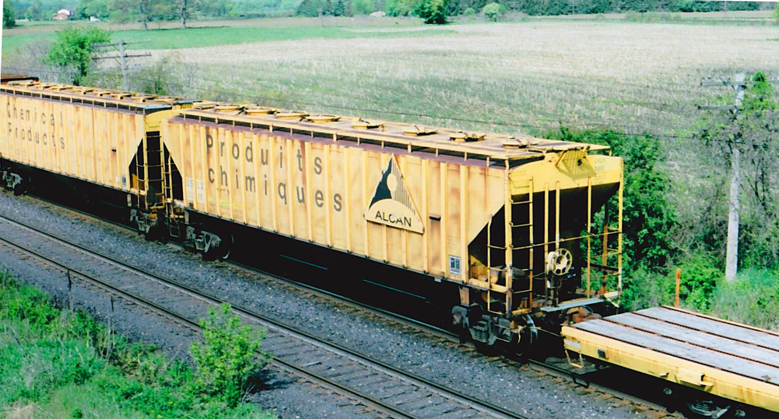 Trackside Treasure: Alcan Covered Hoppers