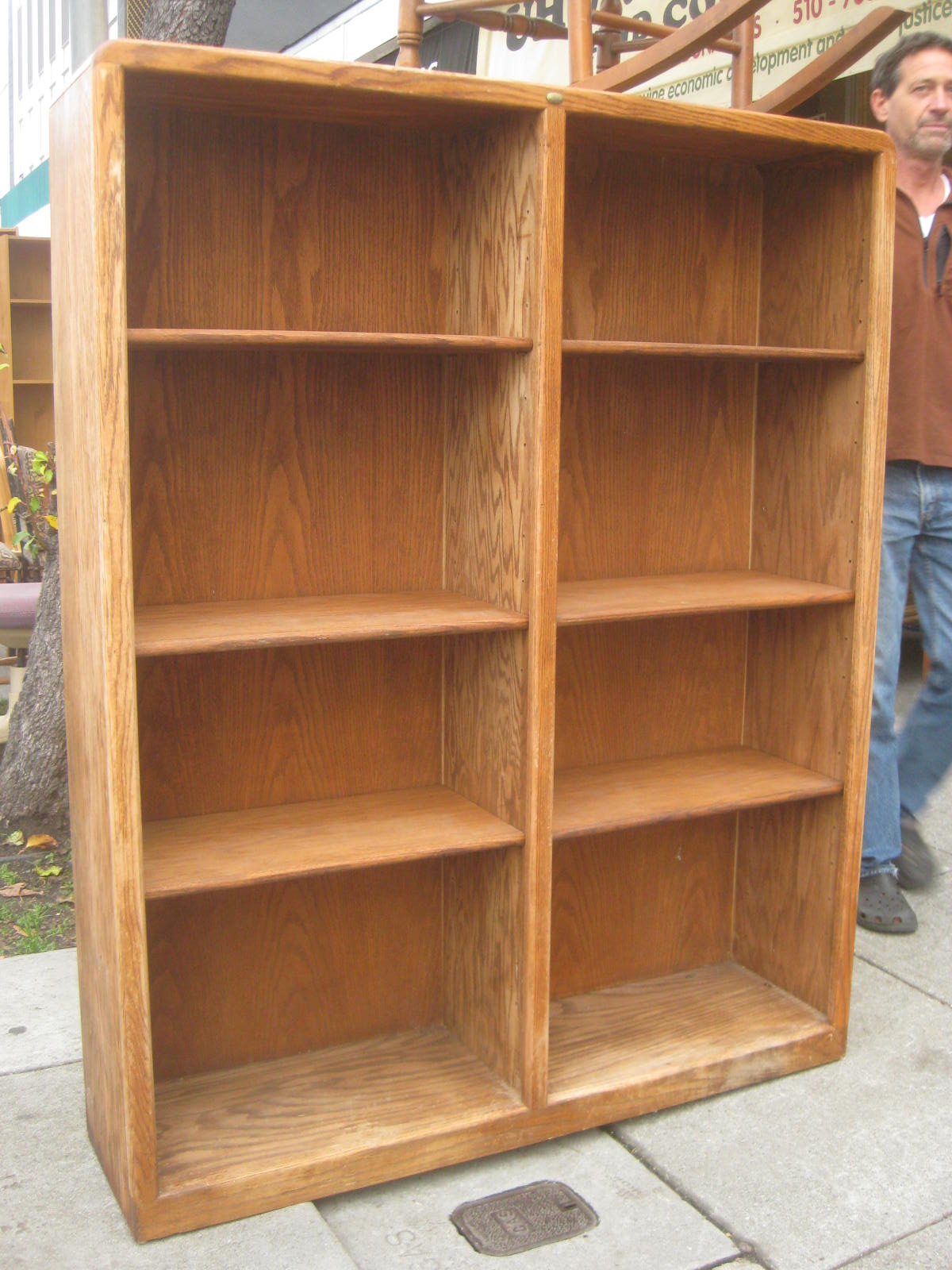 UHURU FURNITURE & COLLECTIBLES: SOLD - Oak Double Bookcase - $100