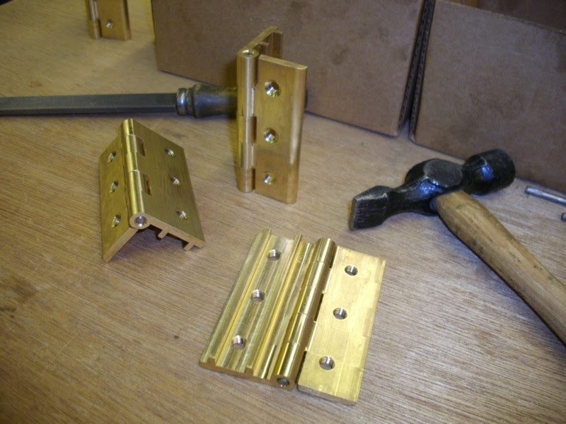 Metal Window Parts: Custom Brass Hinges.
