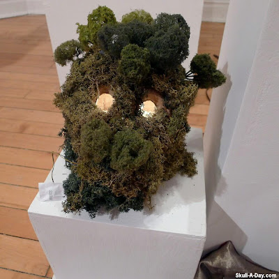 Joshua Poteat- “Landscape with skull and Mockingbird”