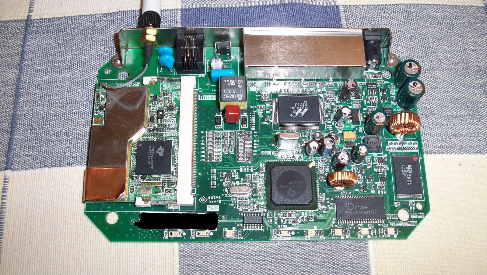 monpjc - The Engineer: Netgear DG834G and DNG2000 Strip Down