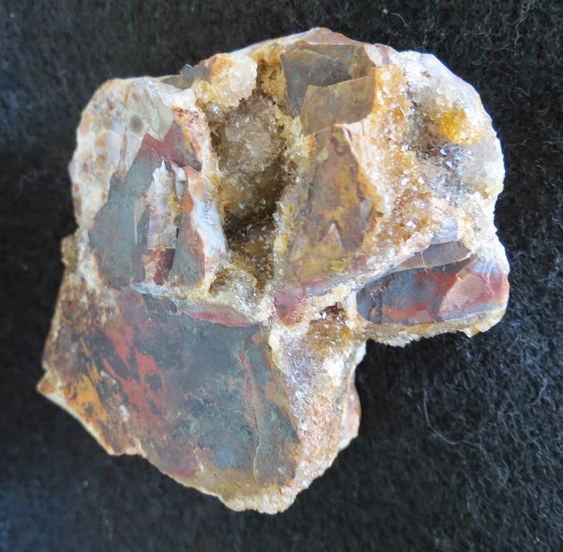 Archaeology of Portable Rock Art: A multi-colored flint and quartz ...