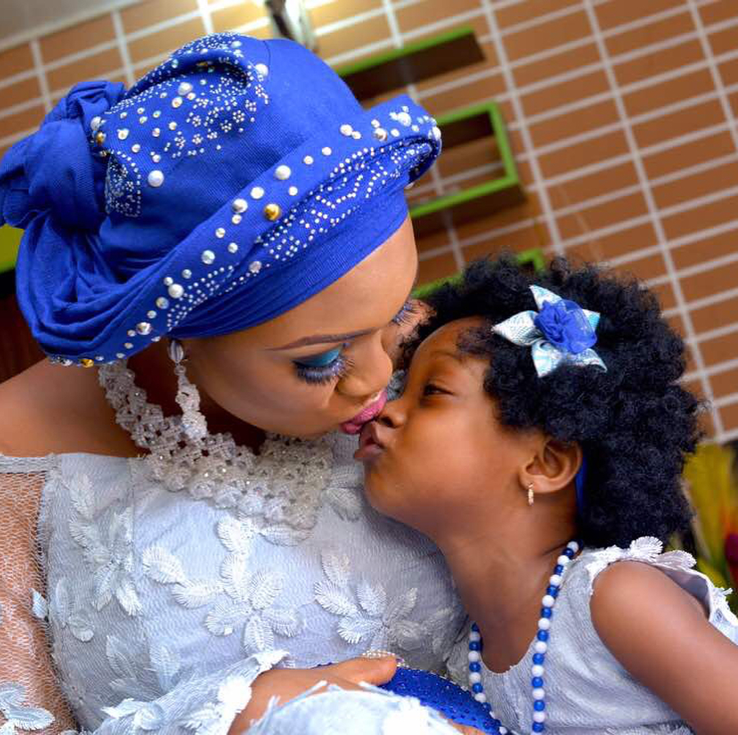 Benita Onyiuke Ugochukwu and her children - son, daughter