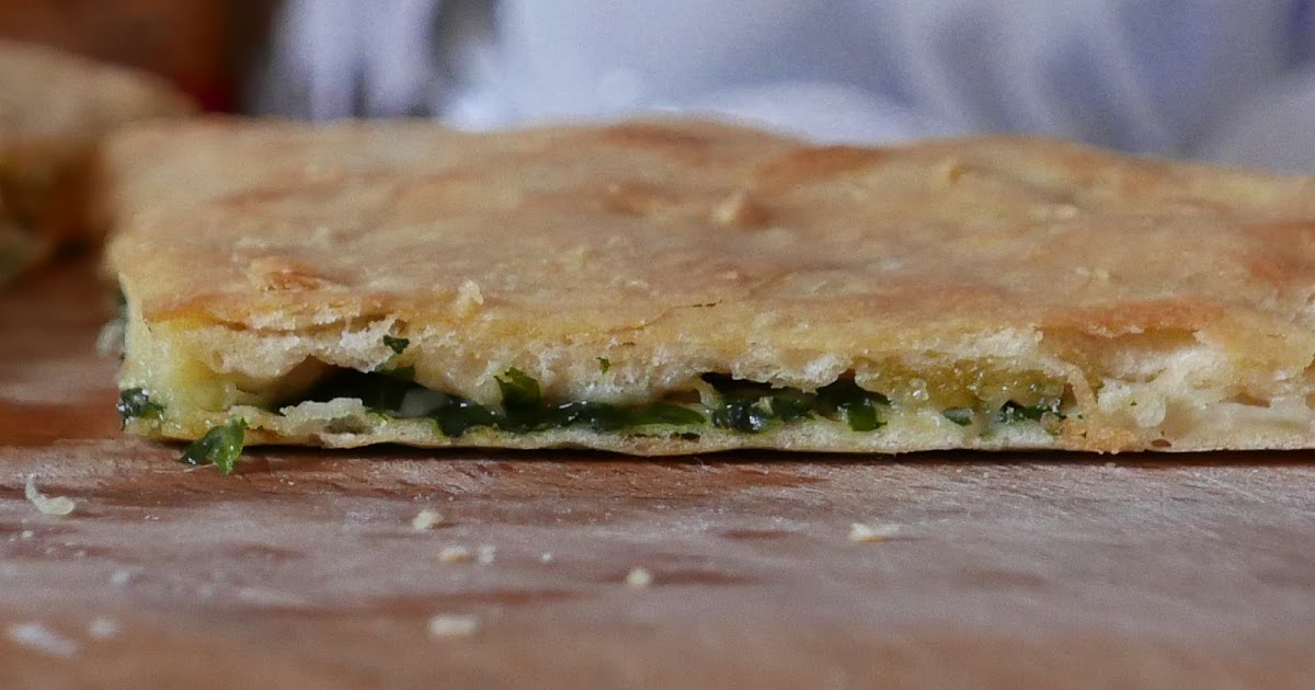 Four seasons.: Georgian cheese bread ( Imeretian khachapuri).