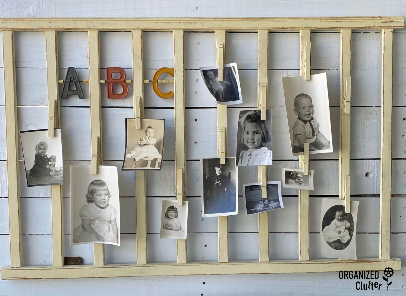Re-Purposed Crib Rail Photo Display - Organized Clutter