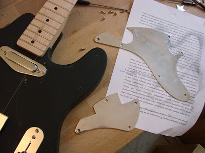 gUitarREN: Sitar bridge and pickguard polishing