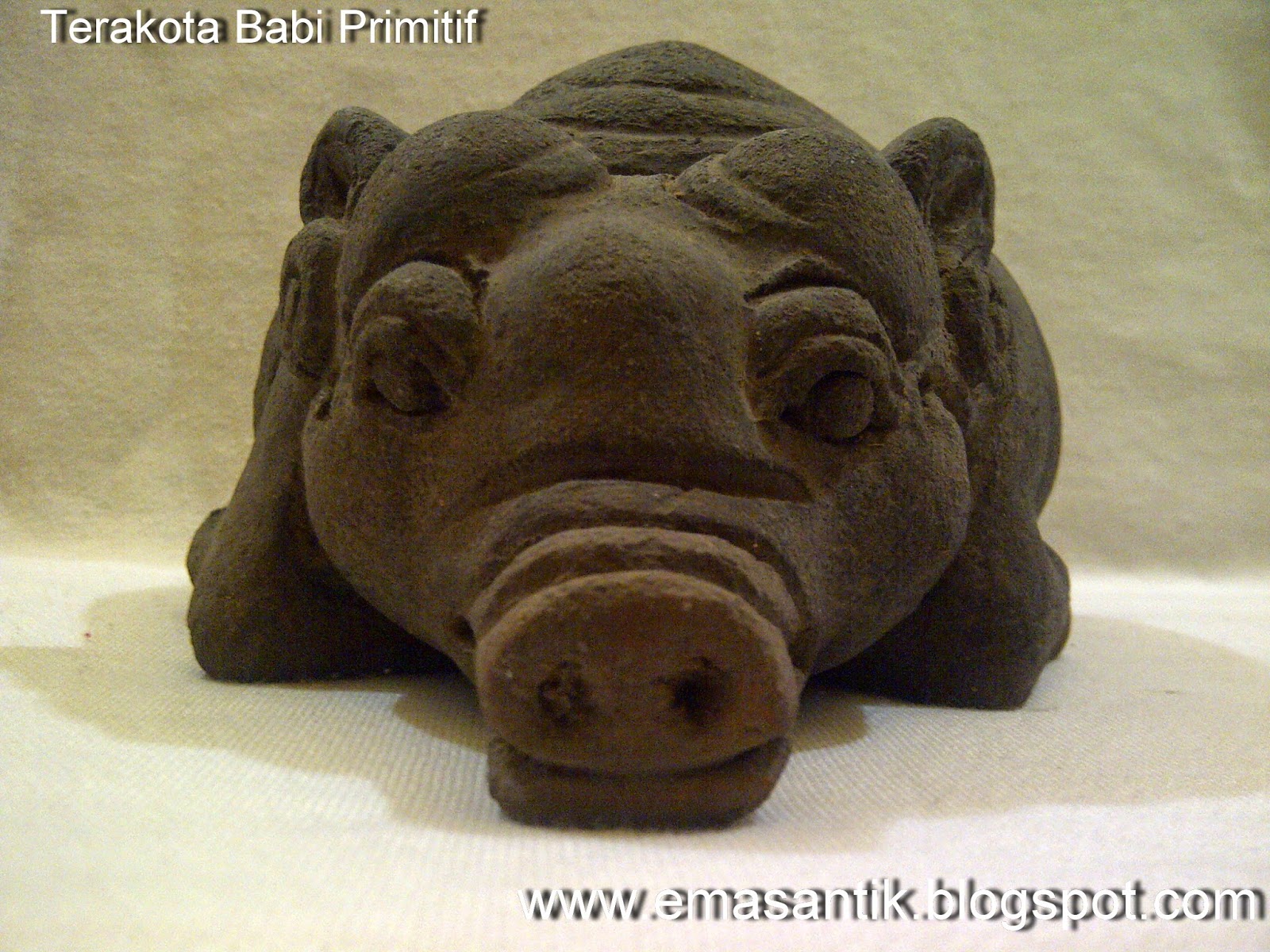 Hobby Antik: Patung Babi Primitif