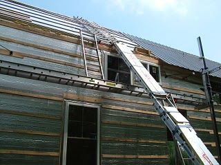 Moving Roofing Supplies With a Lift | Home Improvement