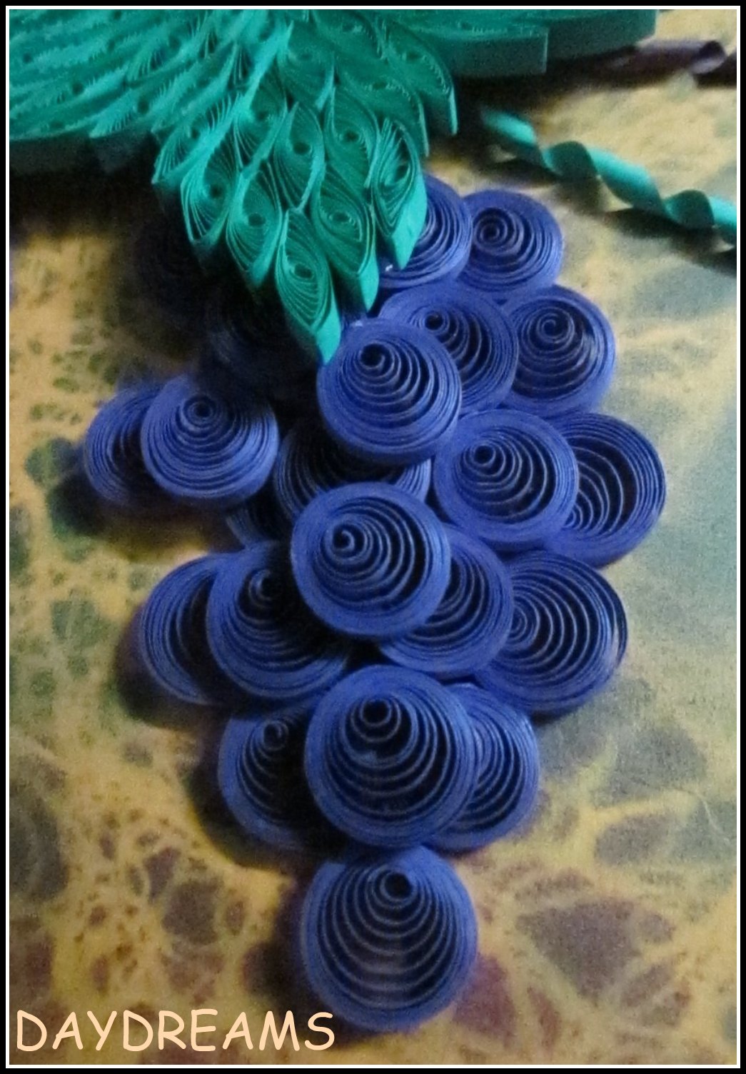 DAYDREAMS: Quilled grape vine.