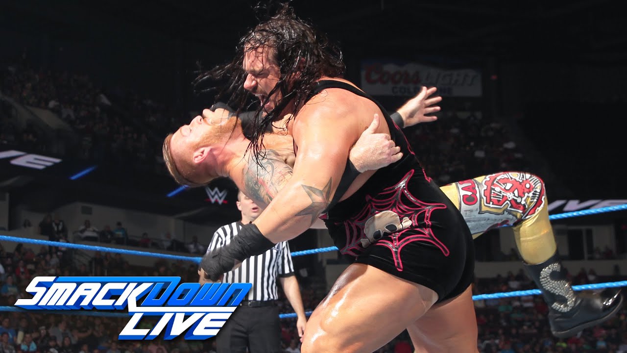 Rhyno Returns On WWE SmackDown Live takes out Heath Slater with a Gore!