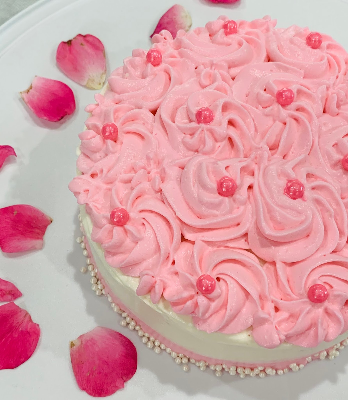 The Sizzling Pan: Dark Chocolate Cake with Neon-Pink Whipped Cream Frosting