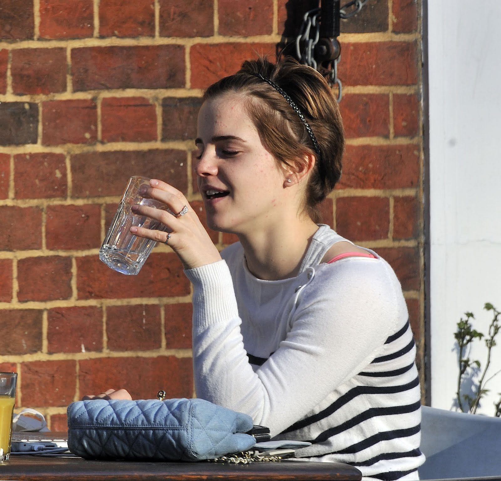 Young Emma Watson Drinking