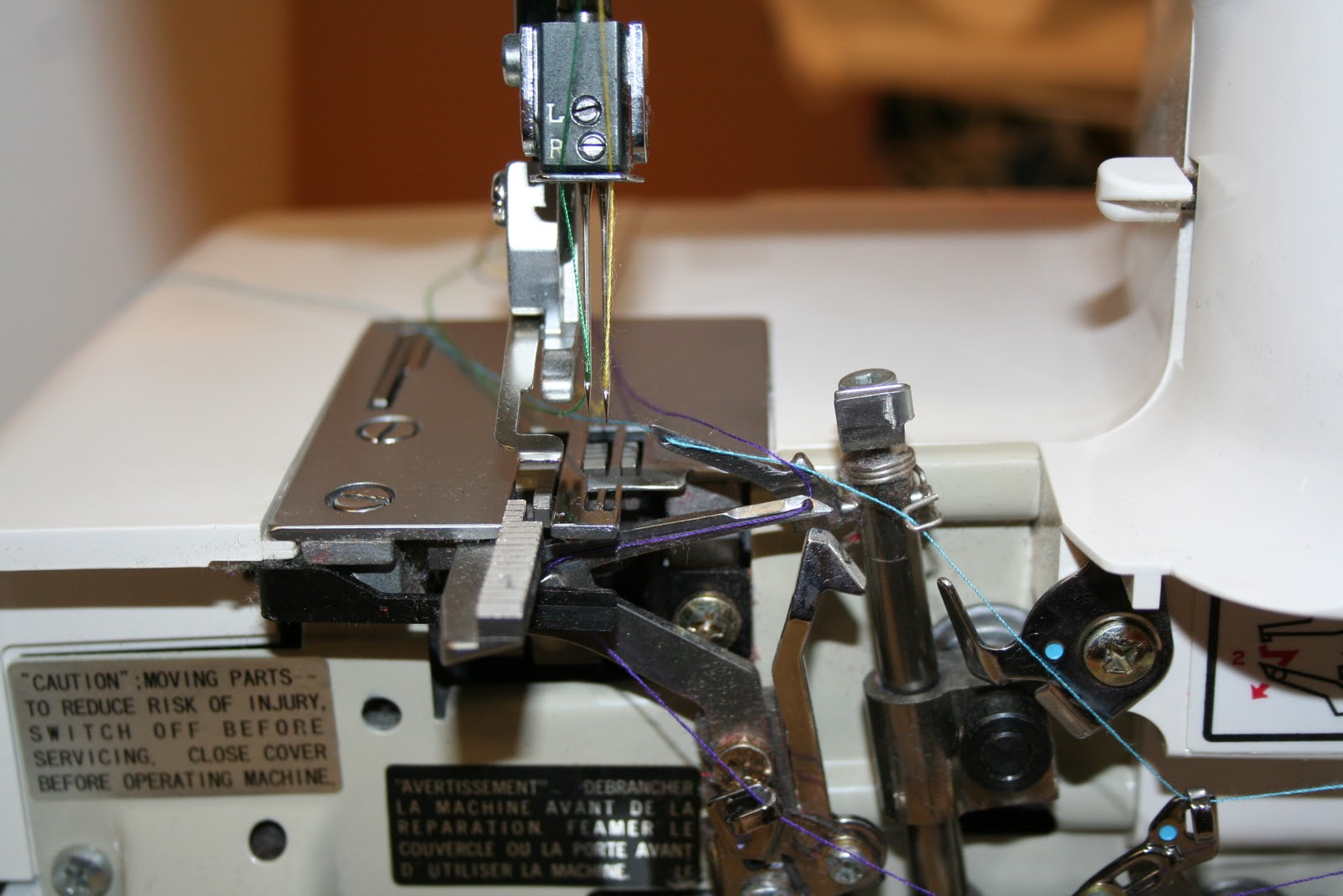 Tammy's Craft Emporium: White Superlock 2000 serger and dog bed.