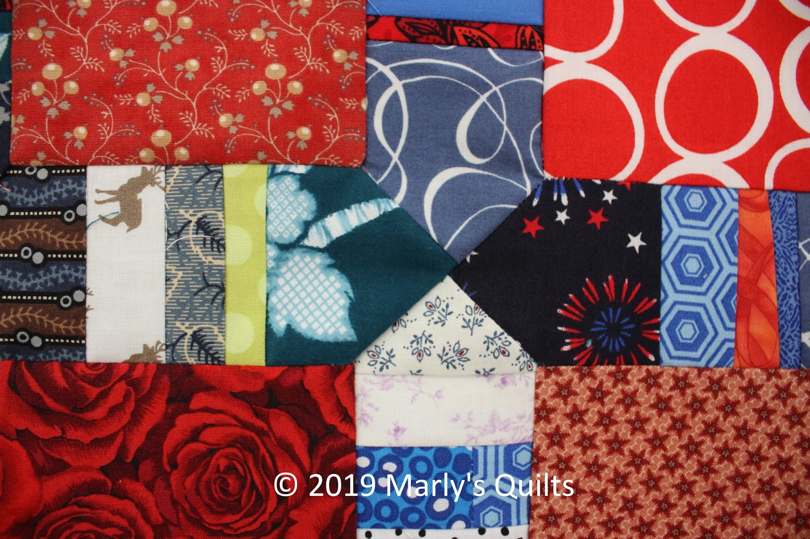 AHIQ: Improvisational Utility Quilts: Overlapping Octagons with red centres