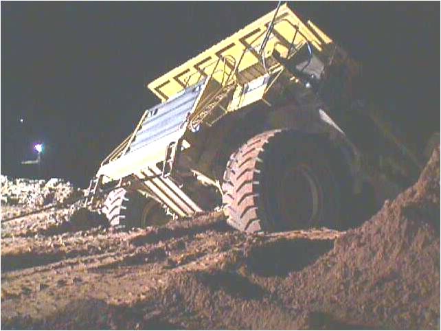 Mining Mayhem: Rear-Dumper Off Tip-Head