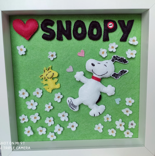 CUADRO SNOOPY ENTRE LAS FLORES