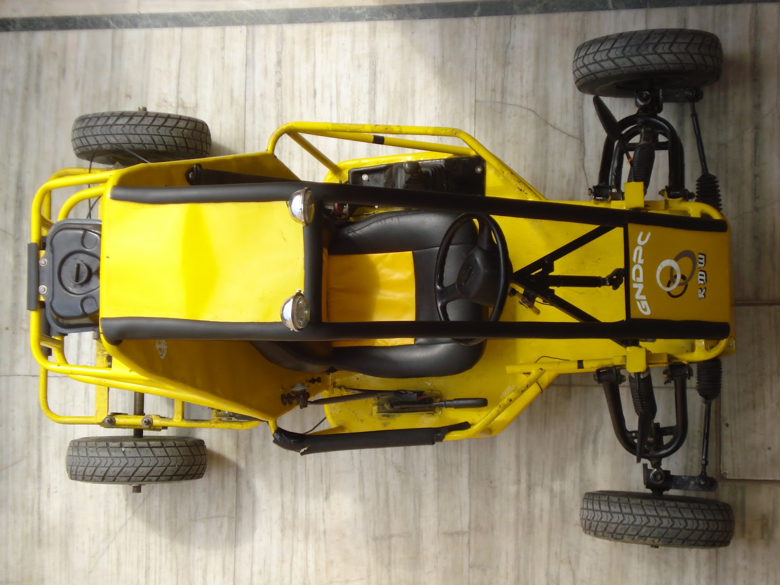 REVVING MOTOR WORKS: TOP VIEW OF GO KART