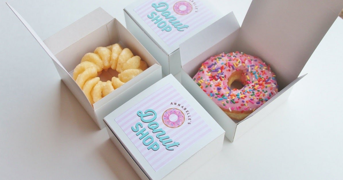 Why did pink become the dominant color for donut boxes?