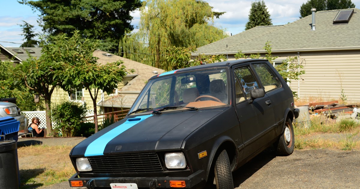 OLD PARKED CARS.: 1987 Yugo GV.