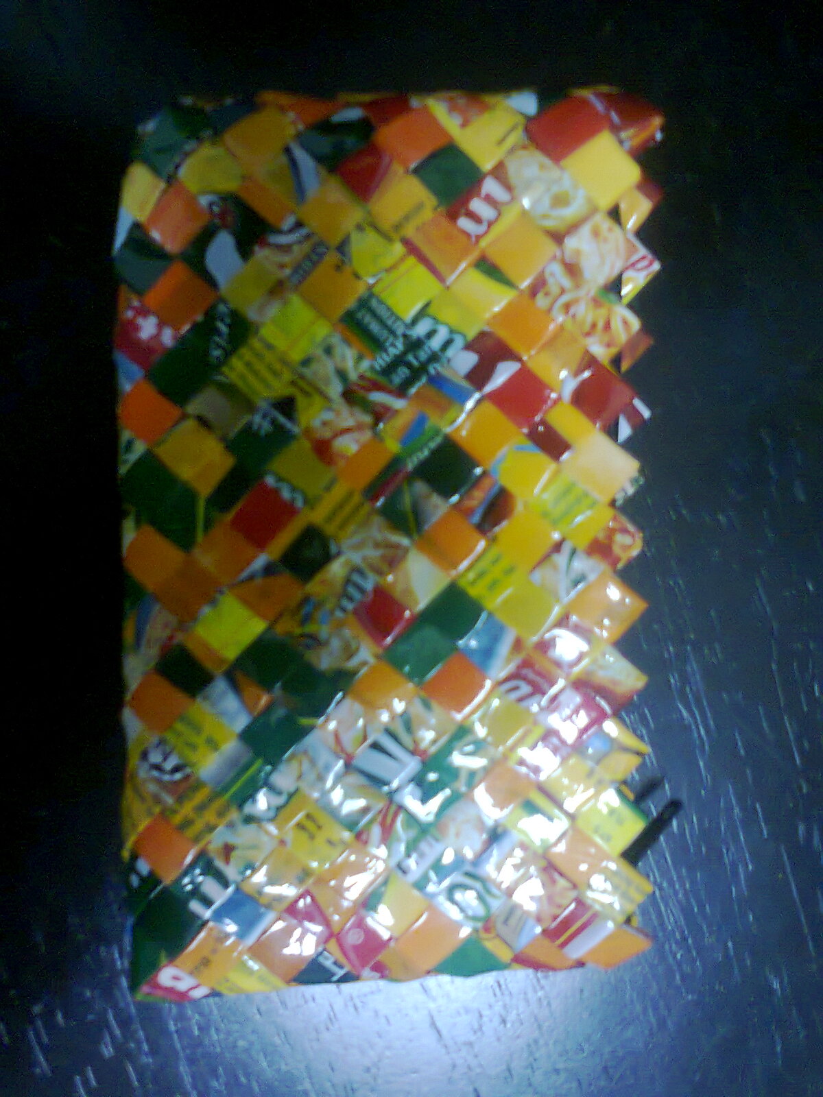 BlissedOutApparel: Its a creative handicraft purse made by recycle items.