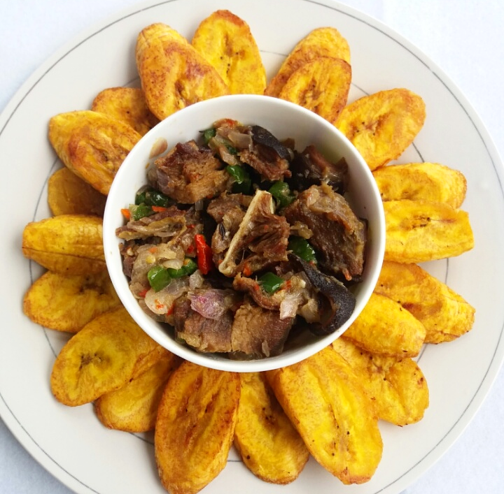 Woma's menu : ASUN(SPICY SMOKED GOAT MEAT)WITH DODO(PLANTAIN)
