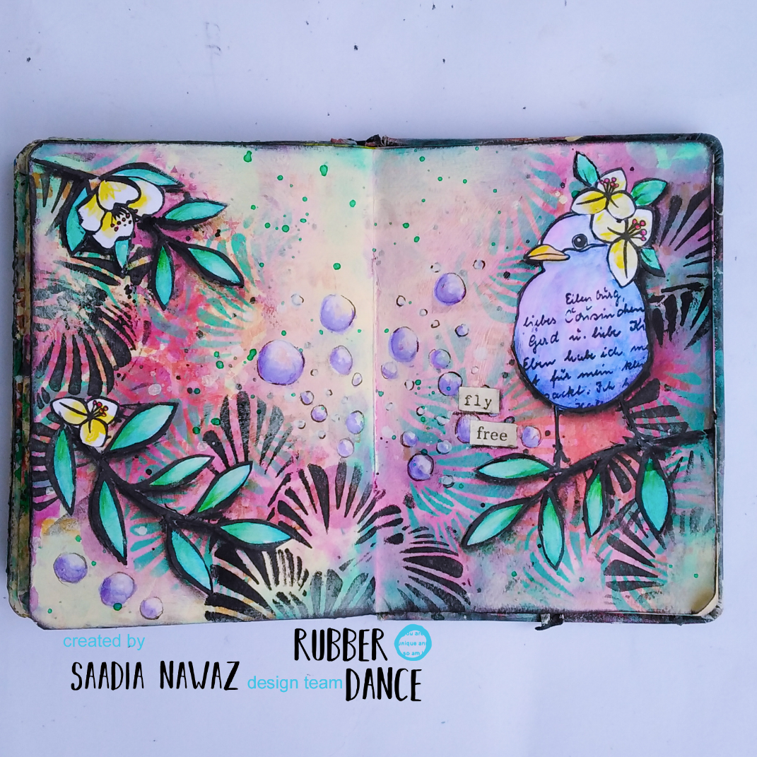 A spring themed art journal spread with Textured birds stamp by Saadia ...