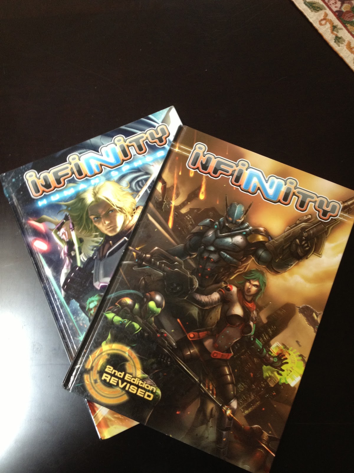 Roll of the Dice: 6th Edition 40k vs. Infinity