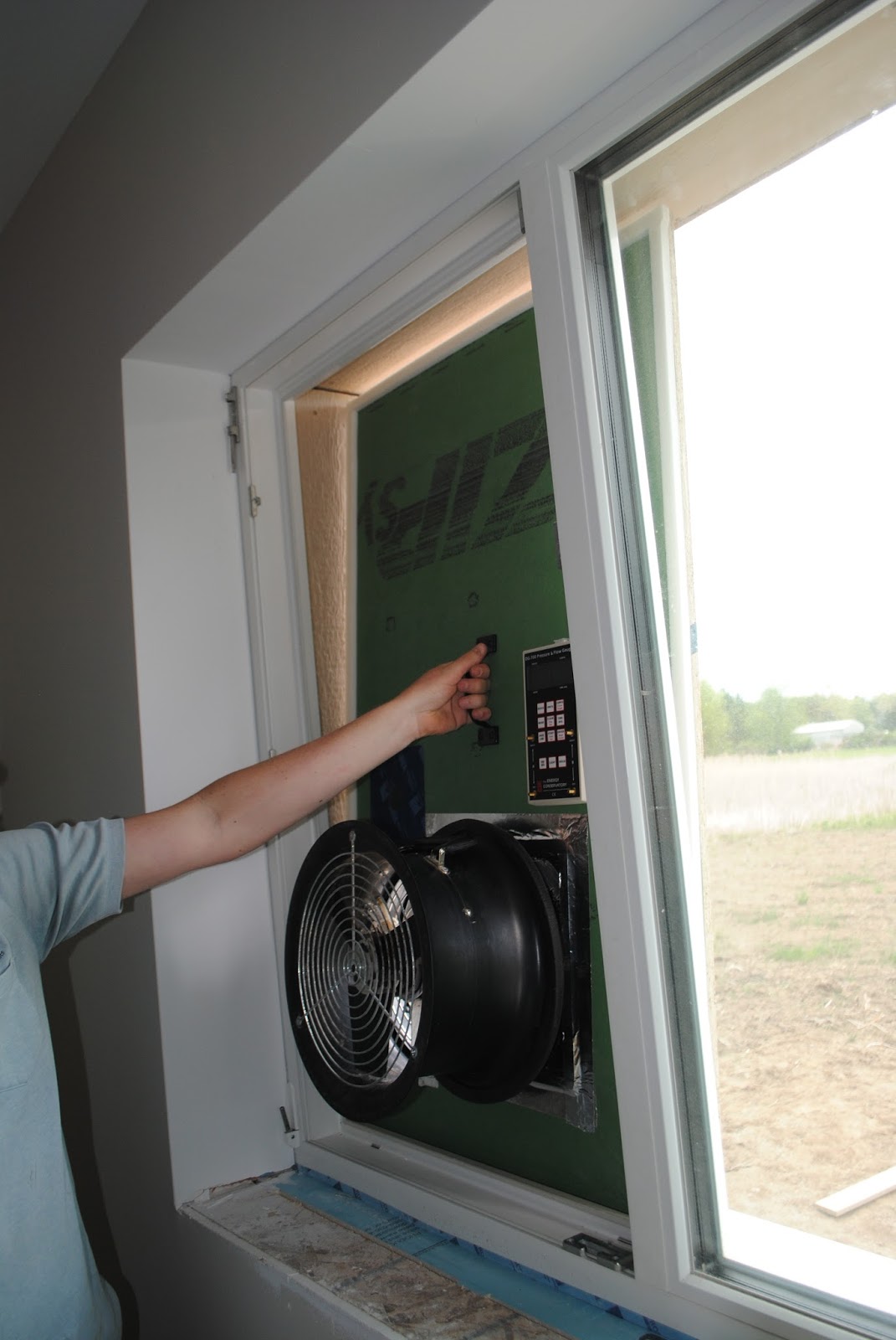 Rochester Passive House: Blower Door / Window Door Tests