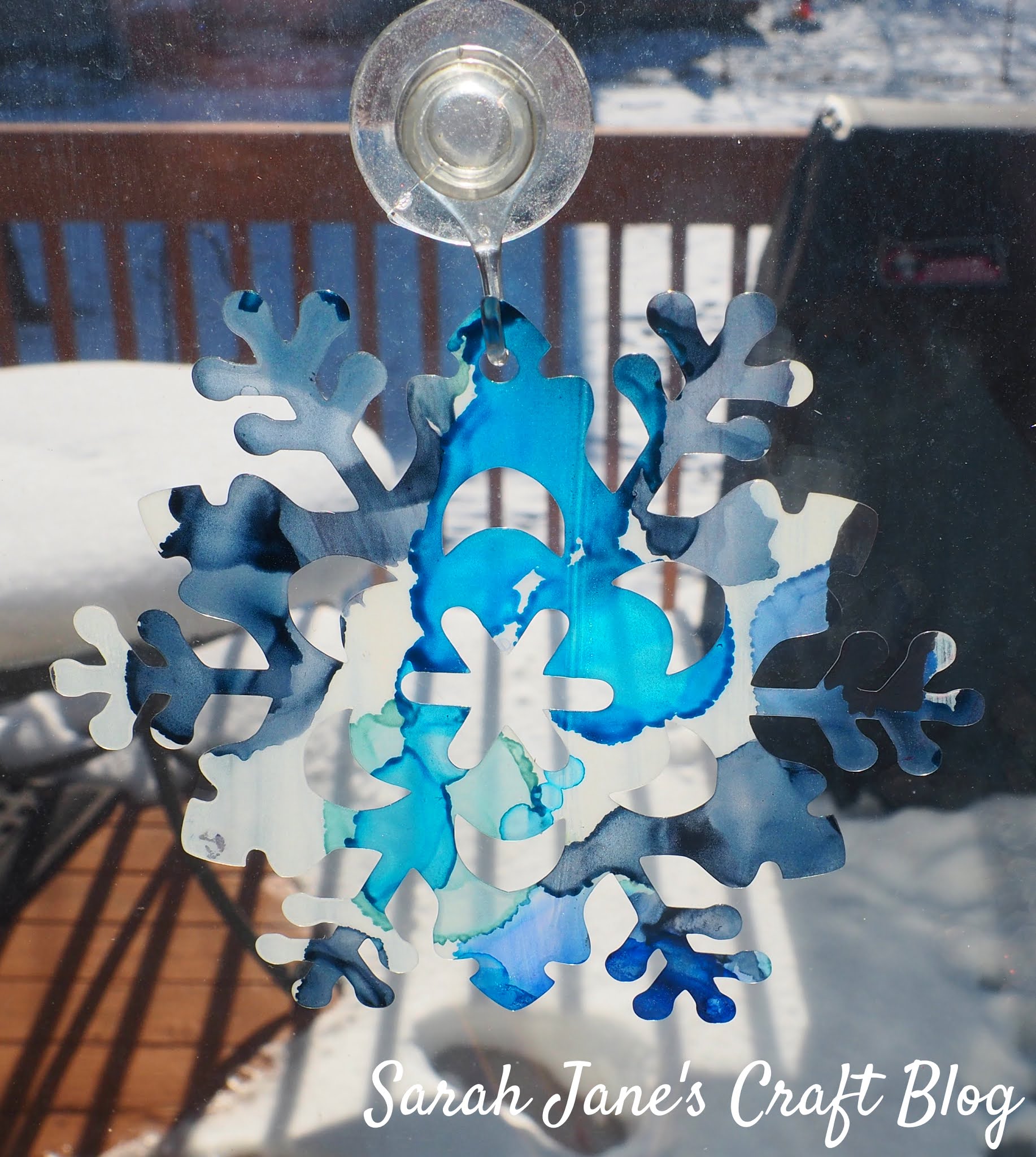 Snowflake Suncatchers from Alcohol Ink on Laminating Pouches